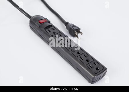 Black surge protector; photo on white background Stock Photo - Alamy