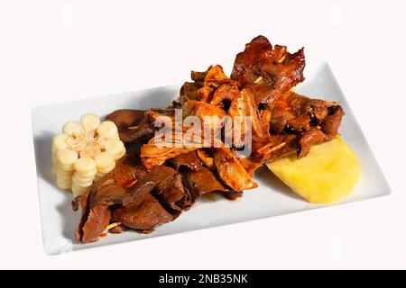 Peruvian traditional food. Veal heart cooked in chunks over charcoal ...