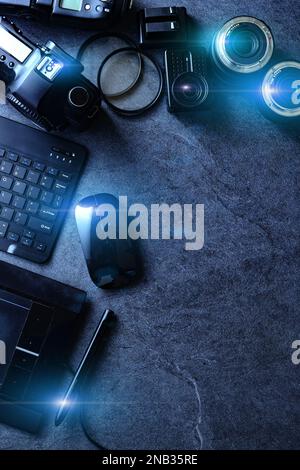 Digital photo workstation over black background.Top view of digital ...