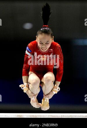 China's Tan Sixin performs on the balance beam during artistic ...