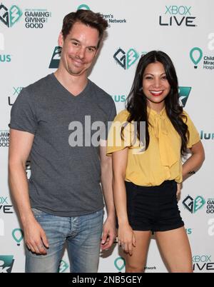 Ginger Gonzaga, right, and Brian Kimmet are seen at the G3 Miracle ...