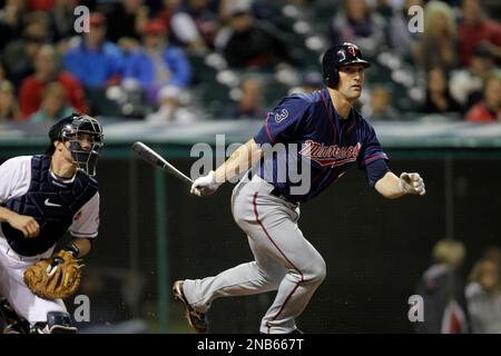 Minnesota Twins' Brian Dinkelman bats during an exhibition spring ...