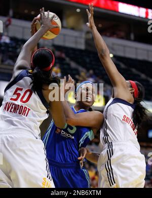 Indiana Fever center Jessica Davenport (50) goes up for a shot against ...