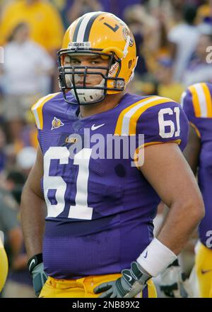 LSU Tigers center Ben Domingue (61) makes a call before a play during ...