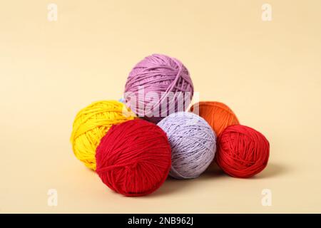 Soft colorful woolen yarns on white background Stock Photo - Alamy