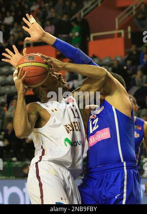 Puerto Rico's Manuel Narvaez, left, and Manuel De Jesus control a ...