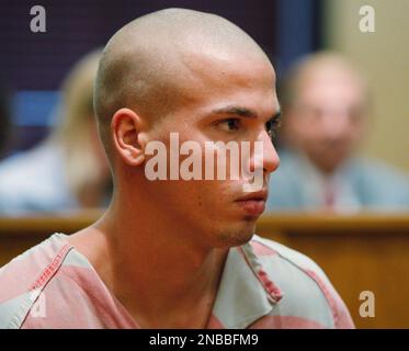 Ryan Dougherty appears in district court to be advised of the charges ...