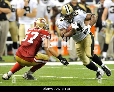 San Francisco 49ers linebacker Keaton Kristick (57) looks to stop New ...