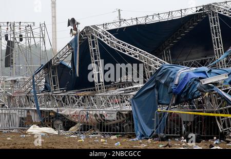 Indiana State Police and authorities survey the collapsed rigging and ...