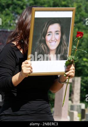 During the funeral of one of the victims of the rampage shooting ...