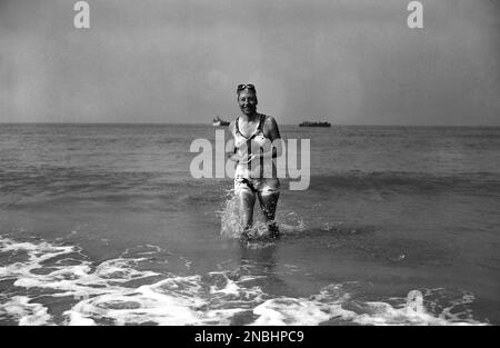 Florence Chadwick, 32, of San Diego, California, became the first woman ...