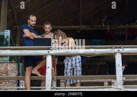 Marine Conservation Cambodia geographers discussing the mapping of ...