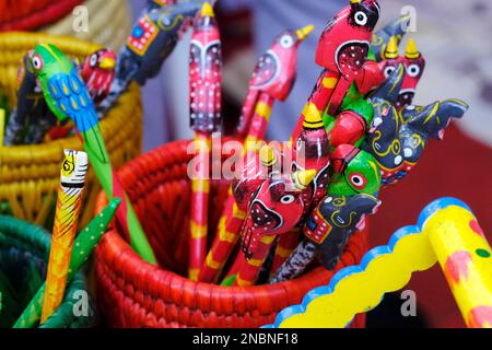 Pune, India, Handicraft items with selective focus, textile and wooden ...