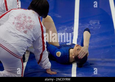 Aliya Mustafina of Russia reacts after suffering from an injury at the ...
