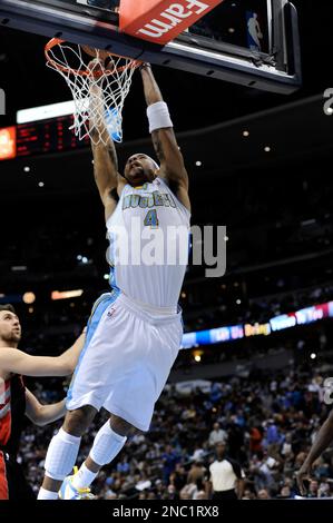 Denver Nuggets forward Kenyon Martin sits on the bench before facing ...