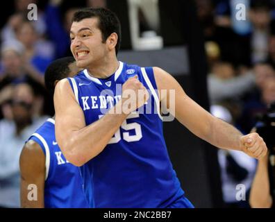 Kentucky's Josh Harrellson (55) reacts after an East regional semifinal ...