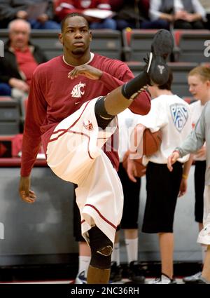 Washington State forward DeAngelo Casto, left, scores over Arizona ...