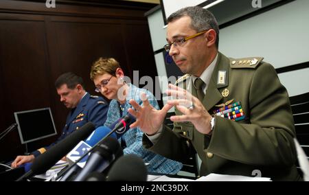 From right, Italian Colonel Massimo Panizzi, NATO spokesperson Oana ...