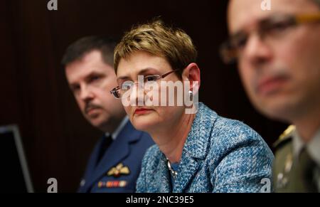 From right, Italian Colonel Massimo Panizzi, NATO spokesperson Oana ...