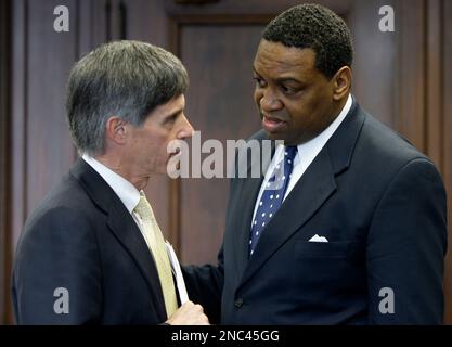 Rep. Tracy Steele, D-North Little Rock, looks a a House agenda before ...