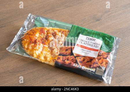 A Tesco supermarket hand finished cheese and tomato flatbread in ...