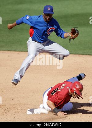Chicago Cubs' Bobby Scales slides safely into third after hitting a ...