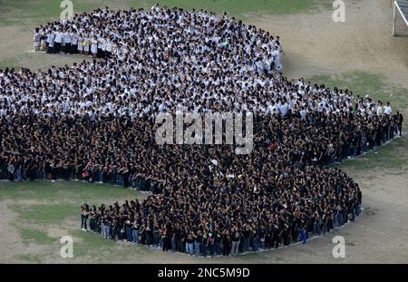 Filipino students, employees, administrators and seminarians from the ...