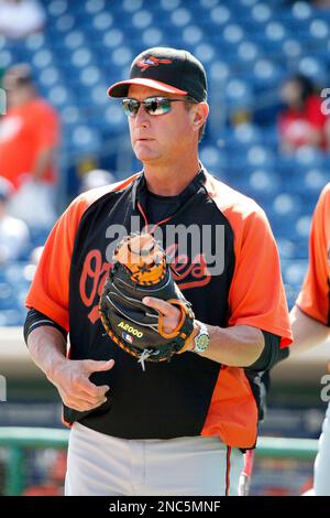 Baltimore Orioles coach John Russell watches the pitchers and catchers ...