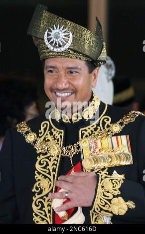 King of Malaysia Sultan Mizan Zainal Abidin and his wife Queen Tuanku ...