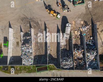 Landfill site, a pile of stinky different junk disposal in the concrete ...
