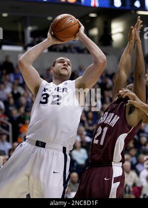 Xavier center Kenny Frease (32) drives against Massachusetts in an NCAA ...