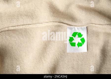 Clothing label with recycling label on cashmere sweater, closeup Stock ...