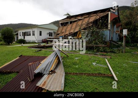 A house is destroyed in Tully, Australia, Thursday, Feb. 3, 2011, after ...