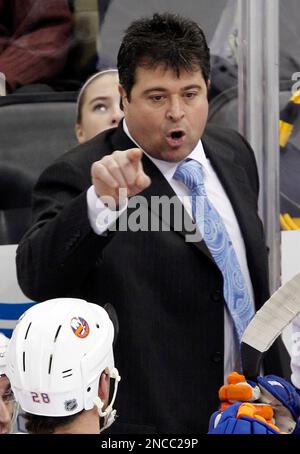 New York Islanders coach Jack Capuano gives directions during the NHL ...