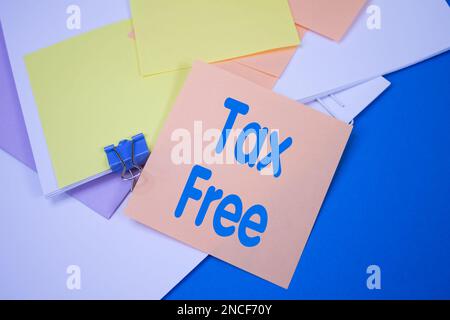 Tax Free. Text on adhesive note paper. Event, celebration reminder ...