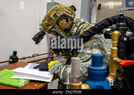 A Soldier assigned to the 56th Chemical Reconnaissance Detachment (CRD ...