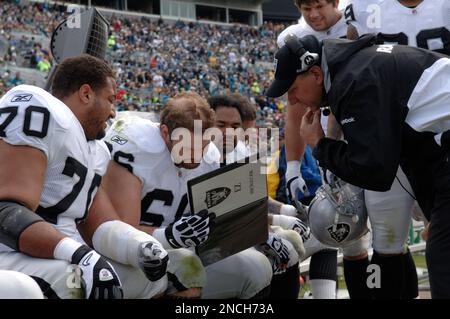 The Oakland Raiders offensive linemen Langston Walker (70), Cooper ...