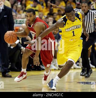 Marquette's Darius Johnson-Odom(1) drives to the basket against St ...