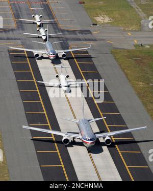 Airport runway track with airplanes in background Stock Photo - Alamy