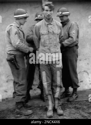 Three German spies captured in American uniforms, armed with American ...