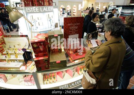 Estee Lauder counter in a store, UK Stock Photo - Alamy