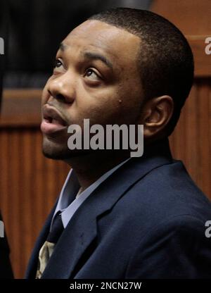 Murder defendant Courtney Lockhart listens during opening statements ...