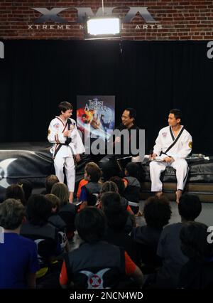 Actor Noah Ringer, left, star of "The Last Airbender", speaks with ...