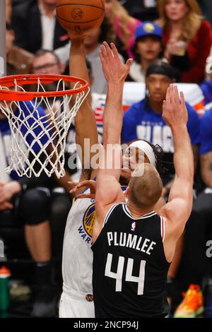 Golden State Warriors guard Moses Moody (4) and forward Draymond Green ...