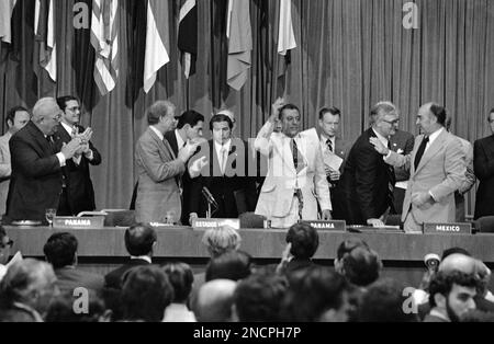 Jimmy Carter and Omar Torrijos signing the Panama Canal Treaty. ca. 06 ...