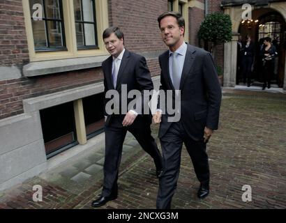 THE HAGUE - Outgoing Prime Minister Mark Rutte and Maarten van Ooijen ...