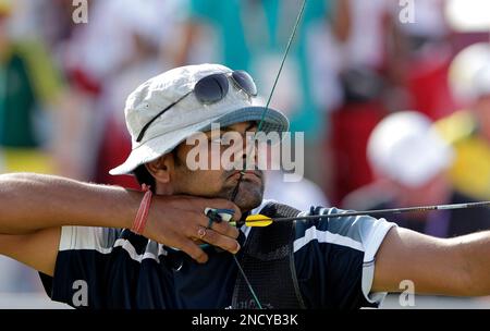 Gold winner India's Rahul Banerjee, center, silver winner Canada's ...