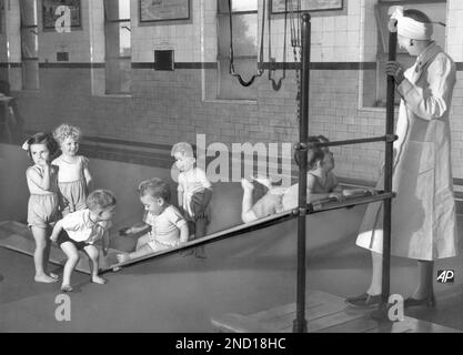 Rickets, curvature of the spine and other physical defects in children ...