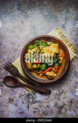 Chicken Woku or Ayam Woku is Spicy basil chicken from Manado, Indonesia ...