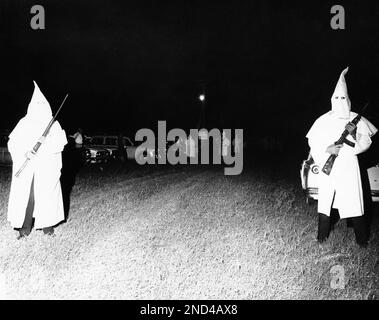 Ku Klux Klansman in robes, armed with two pistols and a sword, c. 1880 ...